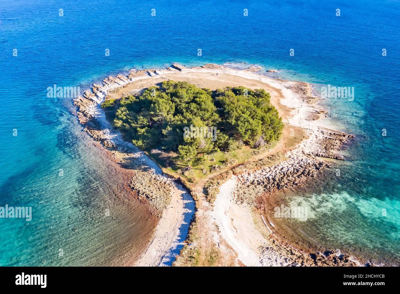 an aerial shot with beautiful colors of half island on Cape Kamenjak ...
