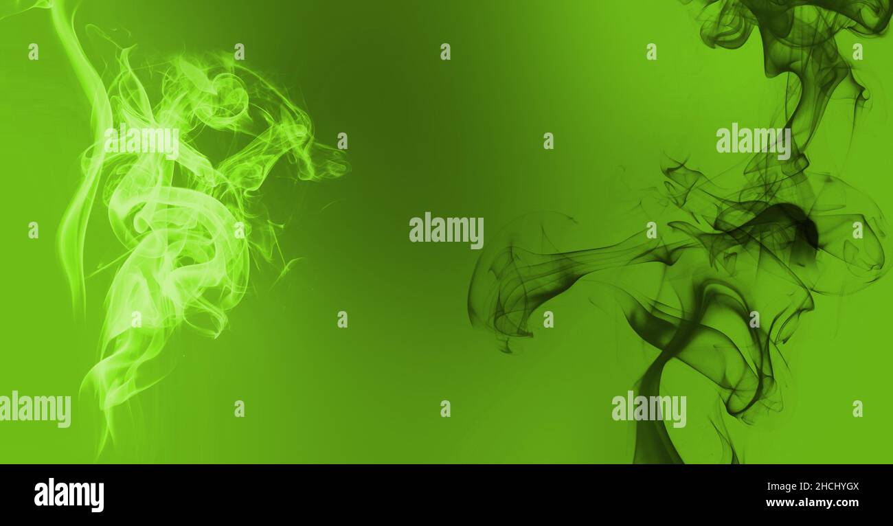 Beautiful dreamy sky with soft pink and mint clouds and smoke over them ...