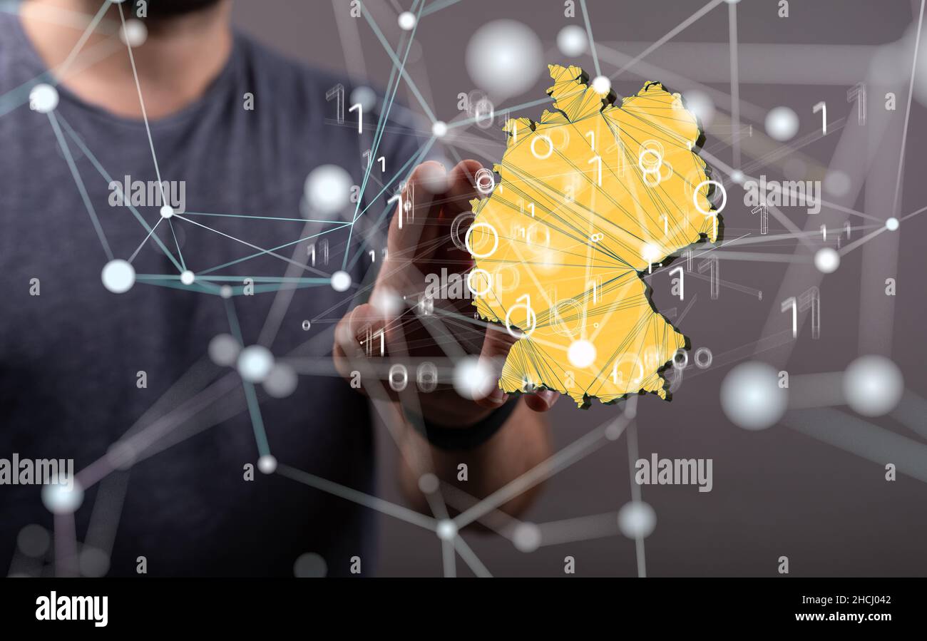 Closeup shot of a hand showing a Germany map icon and digital lines ...