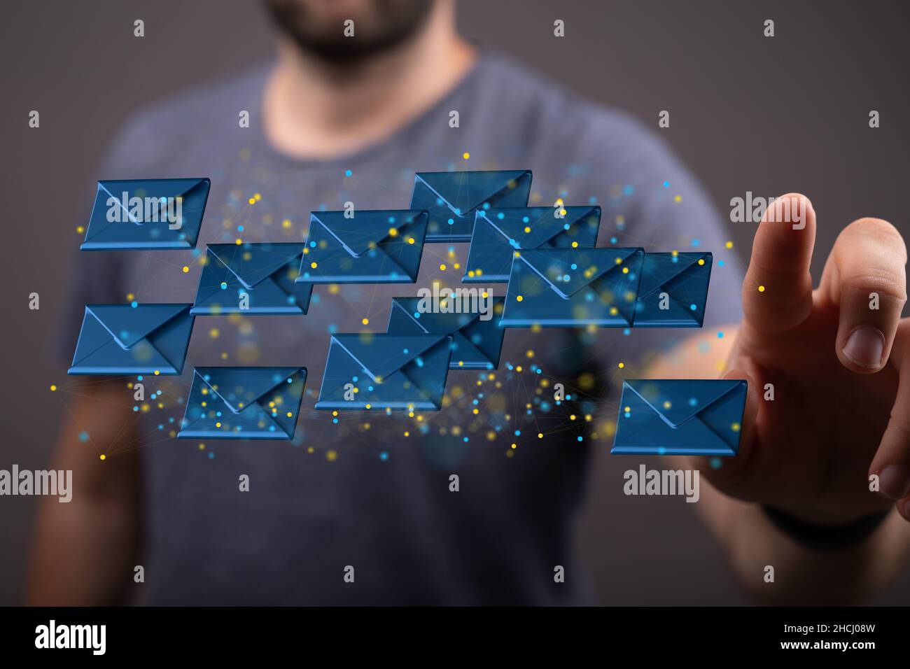 Message icons in front of a person / email concept Stock Photo - Alamy
