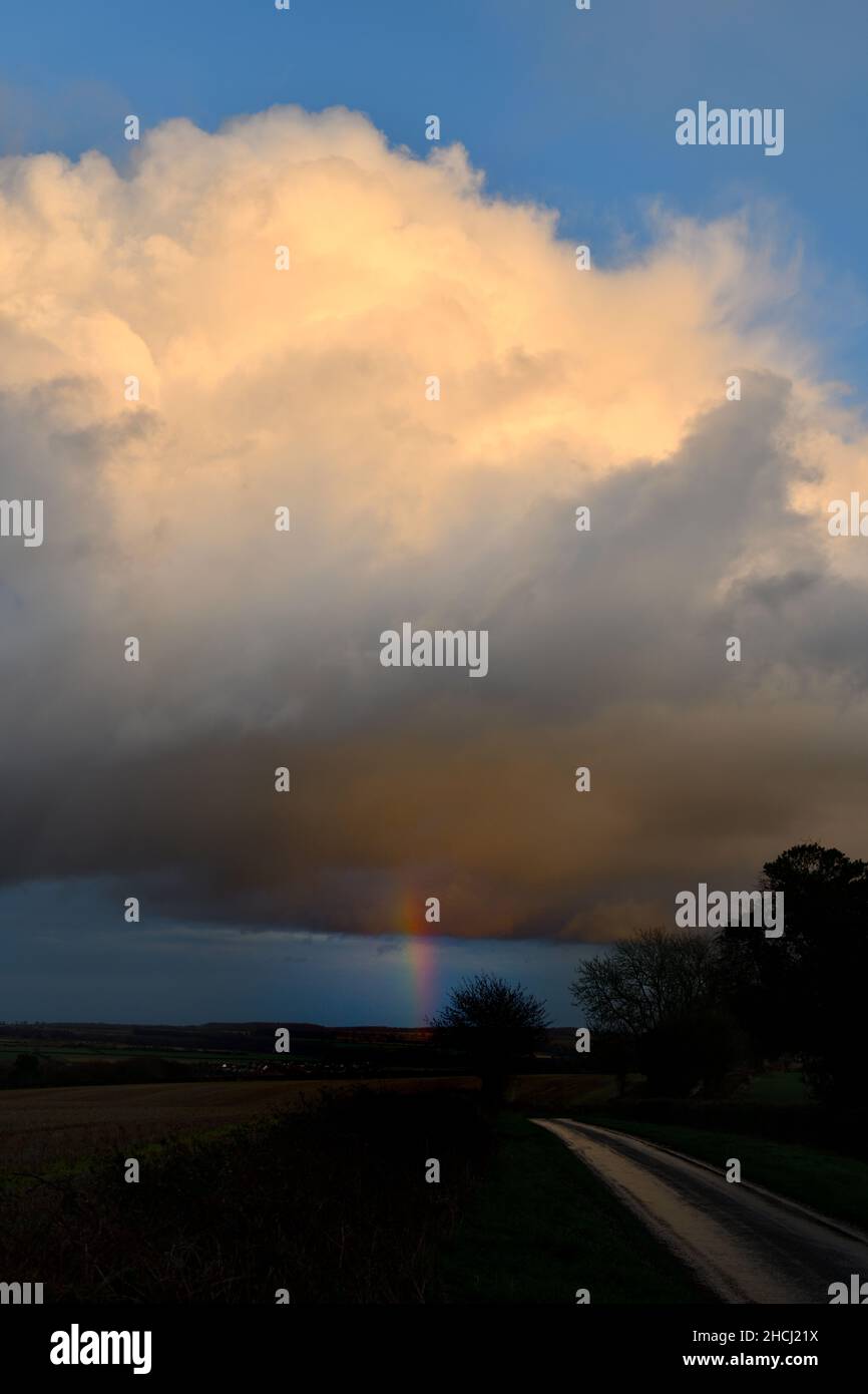 Rainbow over Chadlington Village Oxfordshire England UK Stock Photo - Alamy