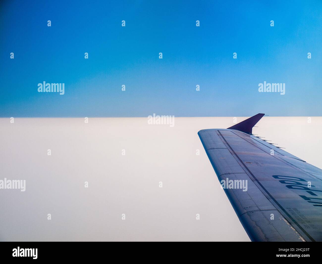 Airplane wing blue sky hi-res stock photography and images - Alamy