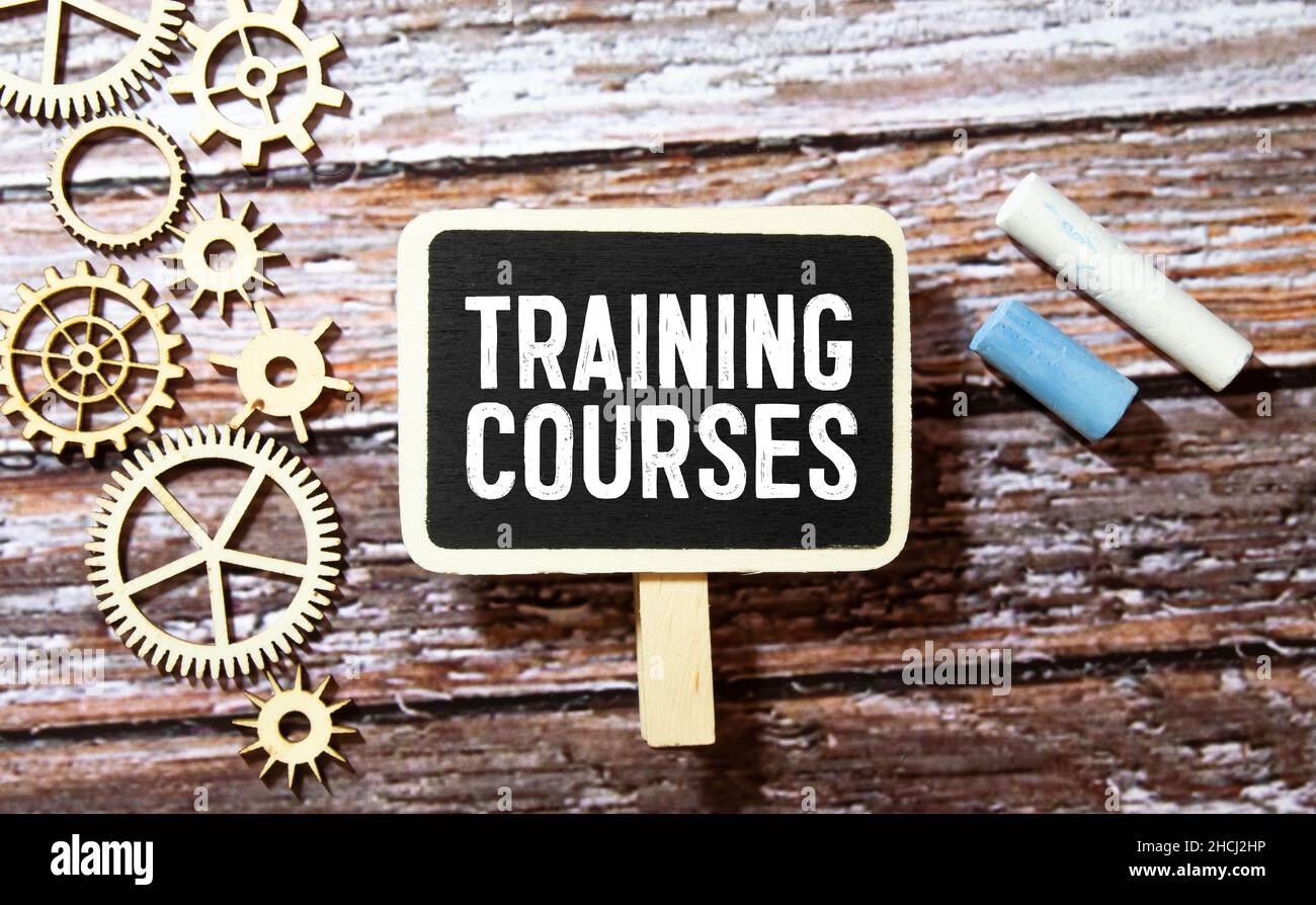 text Training courses on black card Stock Photo - Alamy