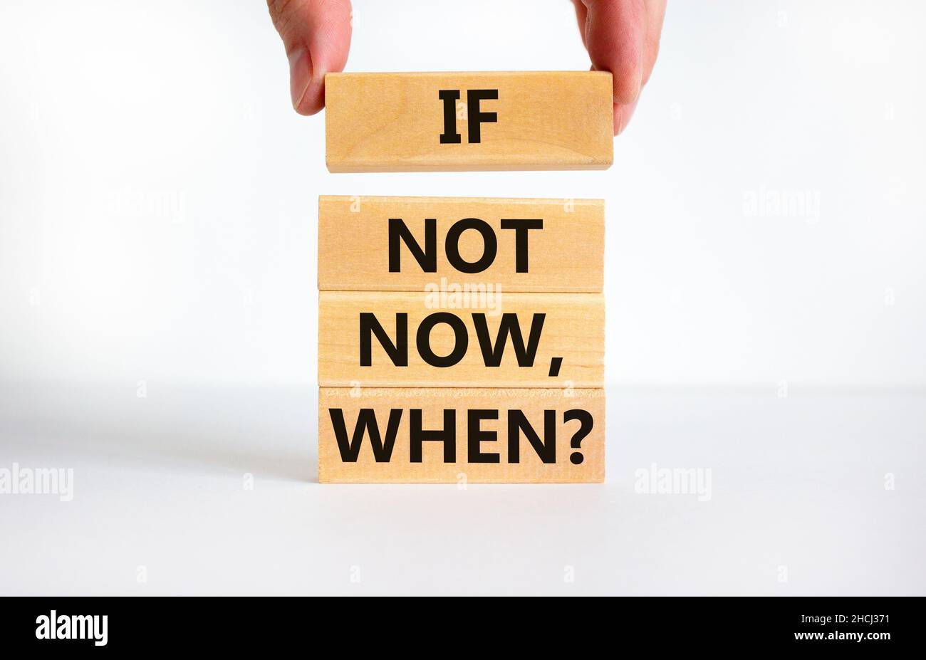If not start now when symbol. Concept words If not now, when on wooden ...
