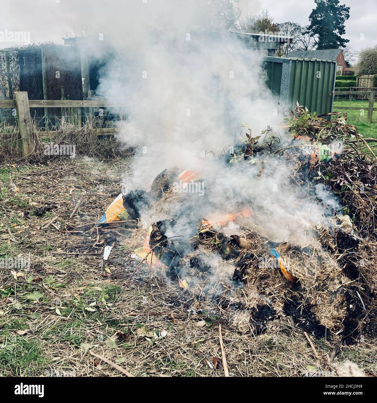 Pollution air burning grass hi-res stock photography and images - Alamy
