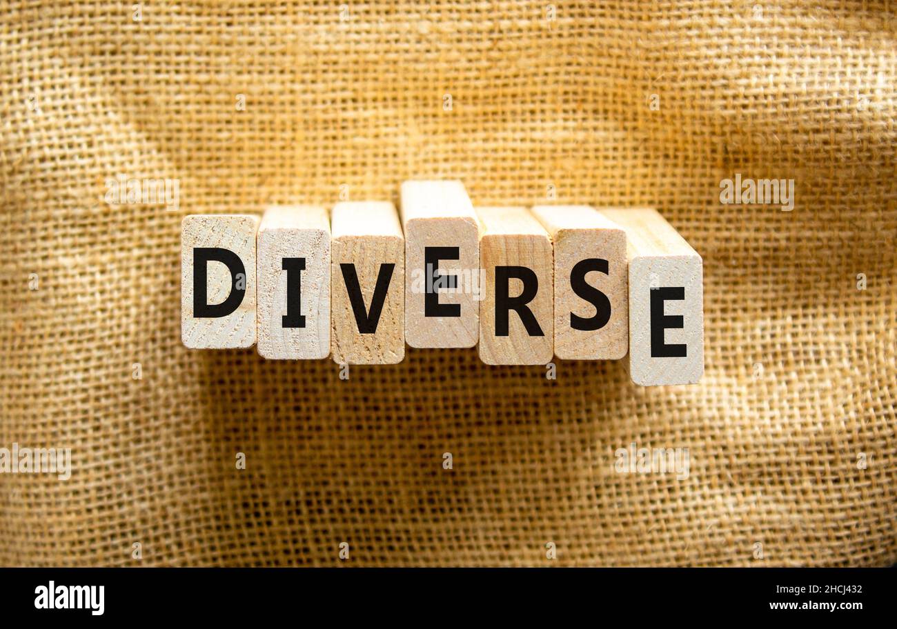 Diverse and diversity symbol. The concept word Diverse on wooden blocks ...