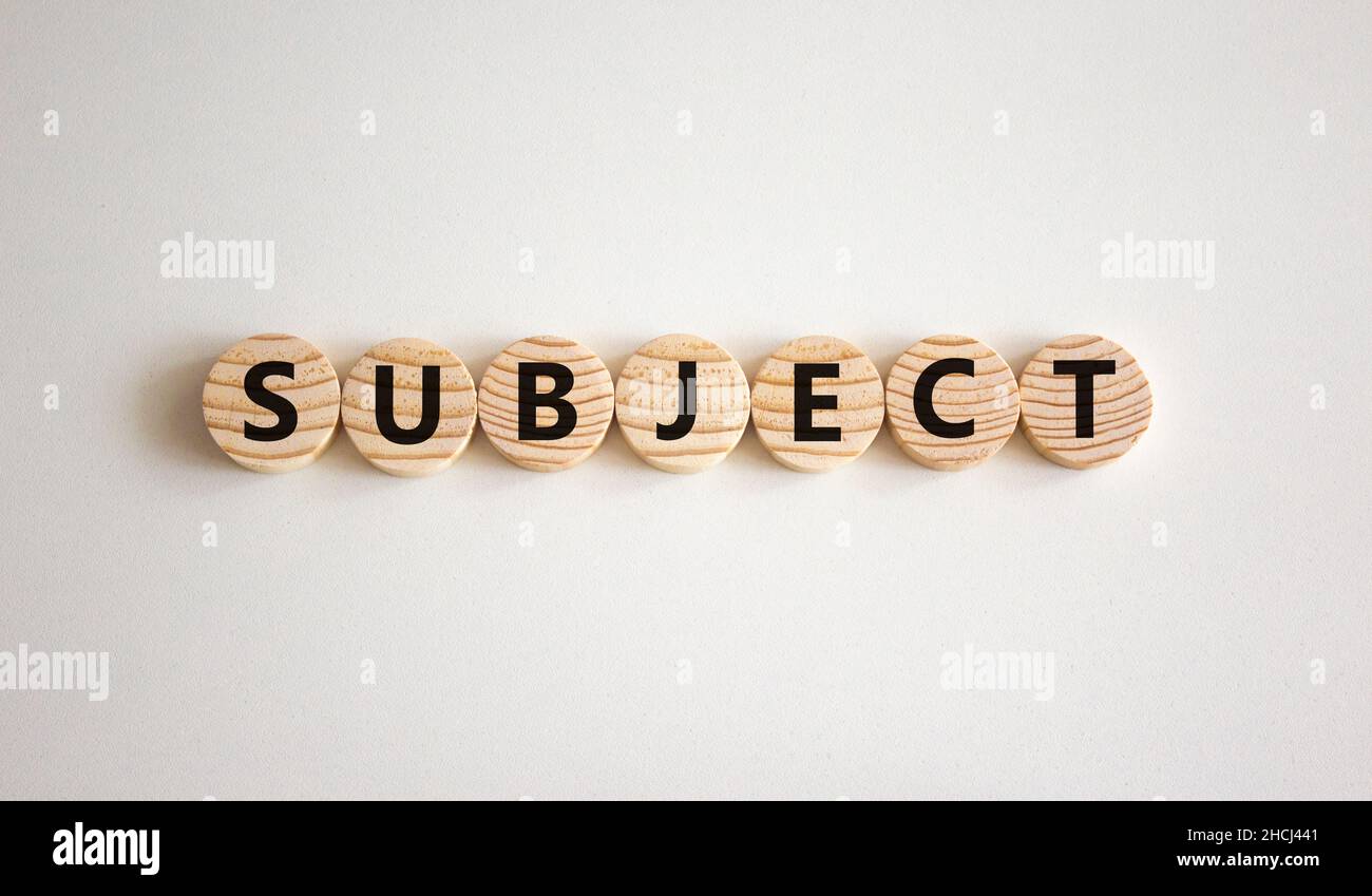 Subject symbol. The concept word Subject on wooden circles. Beautiful ...