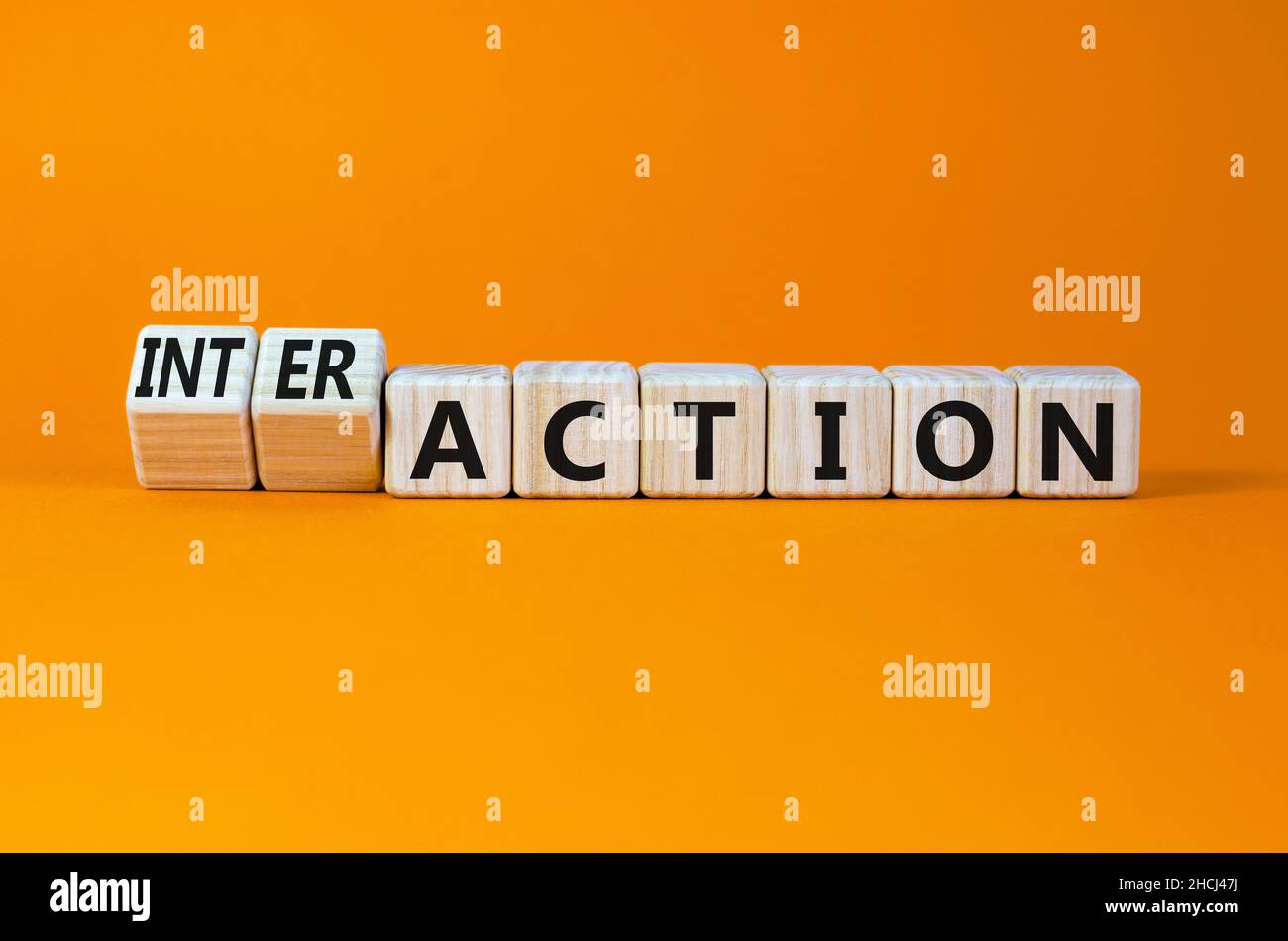 Action or interaction symbol. Turned wooden cubes and changed the word ...