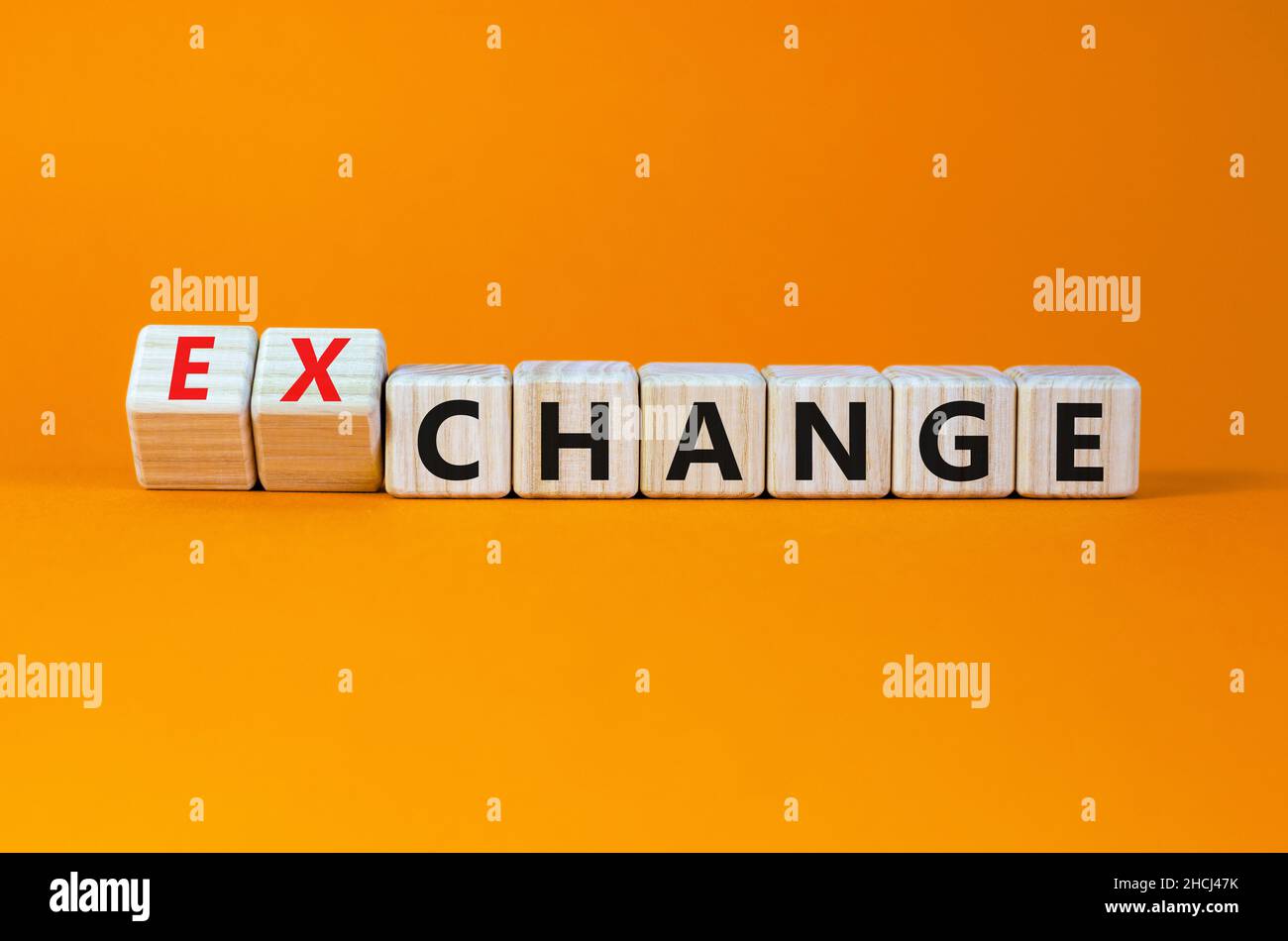 Change or exchange symbol. Turned wooden cubes and changed the word ...