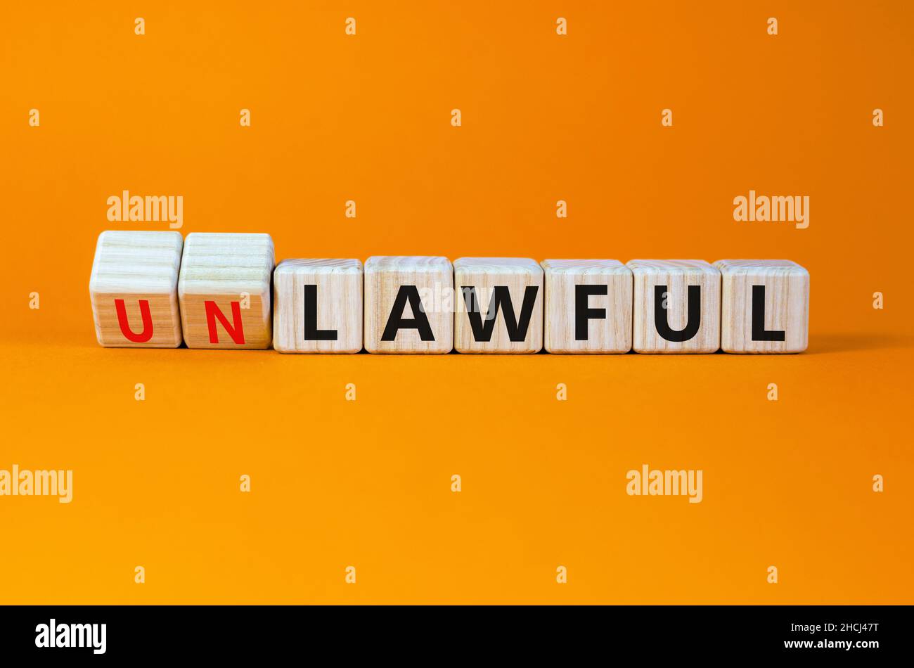 Lawful or unlawful symbol. Turned wooden cubes and changed the word ...