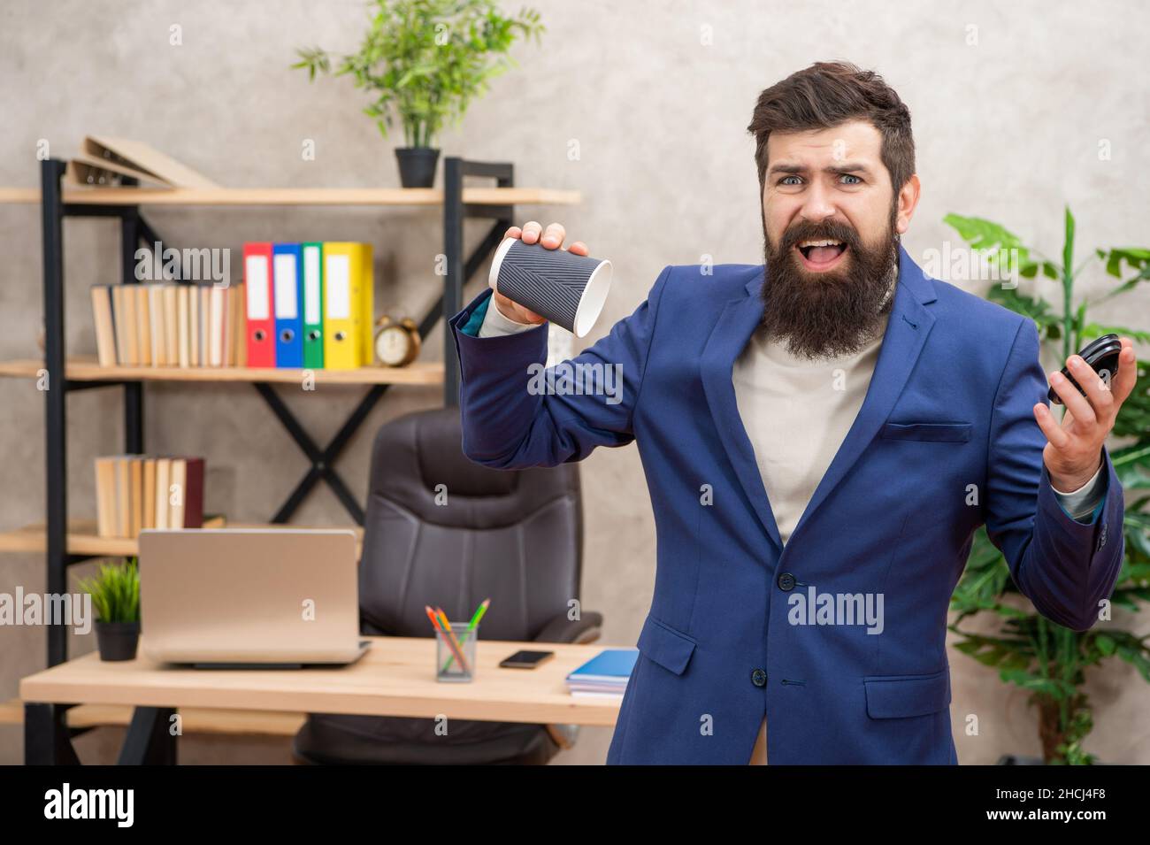 Making complain. Angry man complain of empty cup. Takeaway coffee ...