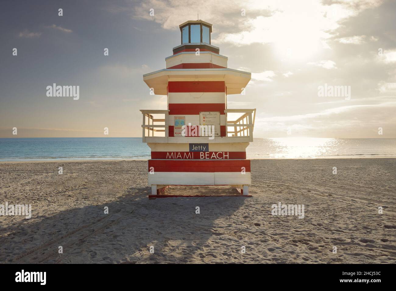 Striped lifeguard tower on the beach during sunset in South Pointe Park ...