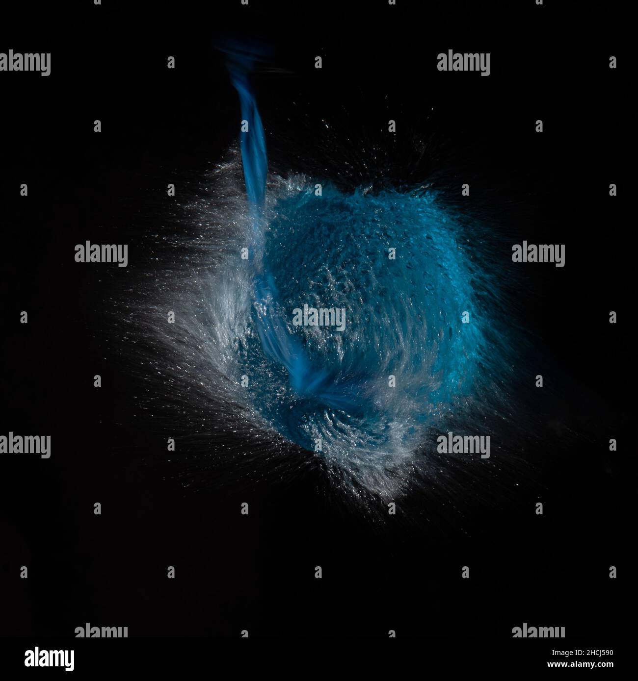blue water filled balloon bursting Stock Photo - Alamy