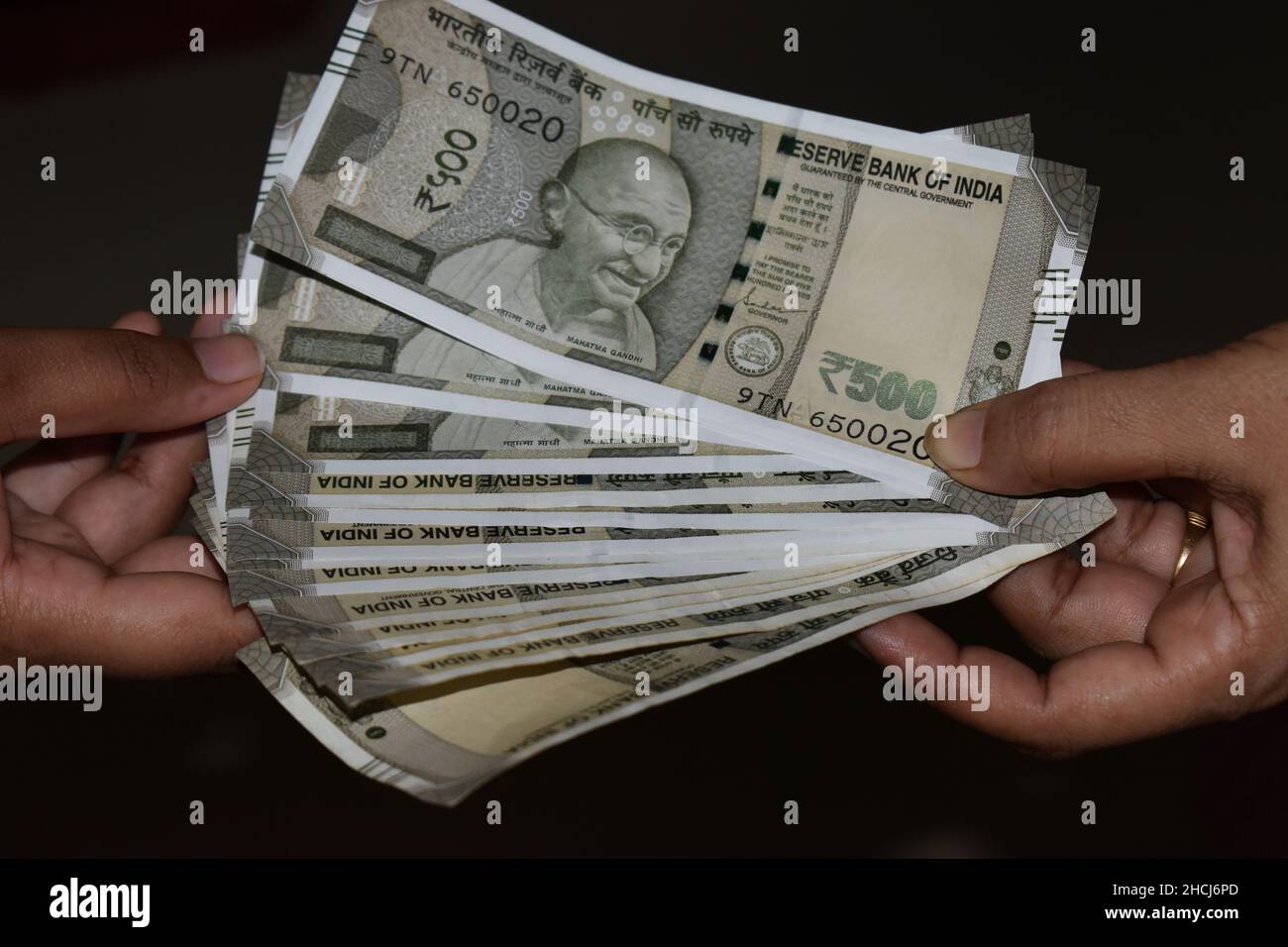 Exchange of Indian rupees between two people as a bribe in Madurai ...