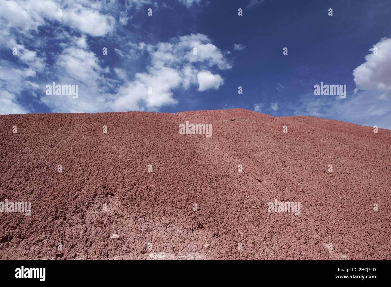 View of red mudstone badlands of the arid barren Painted Desert ...