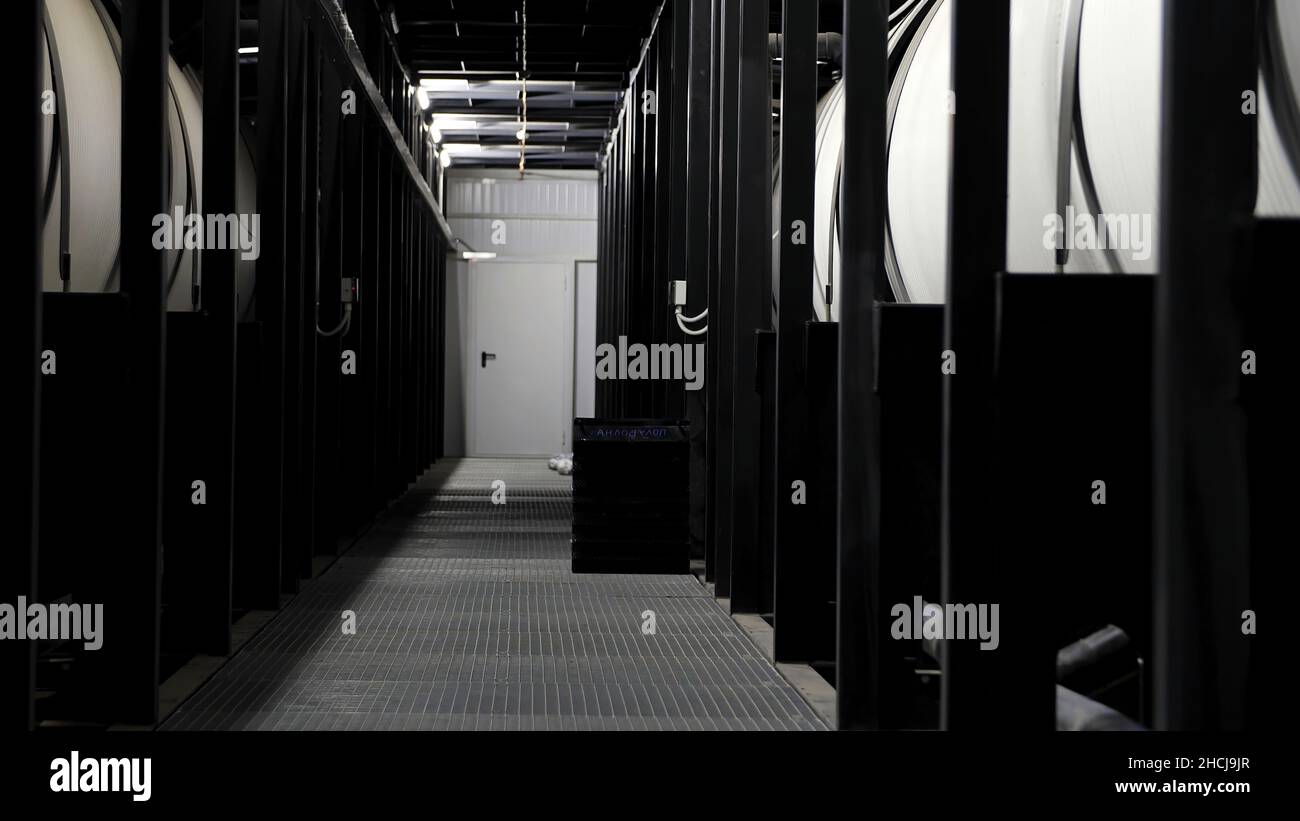 Factory equipment for water purification. Long dark corridor at the ...