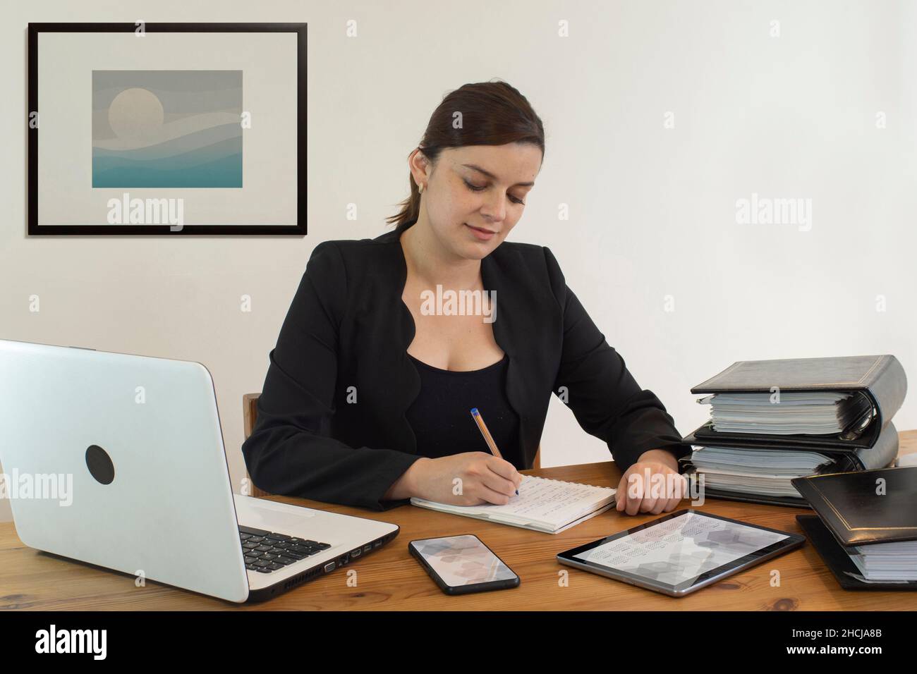 Beautiful Hispanic female executive office worker smiling happy ...