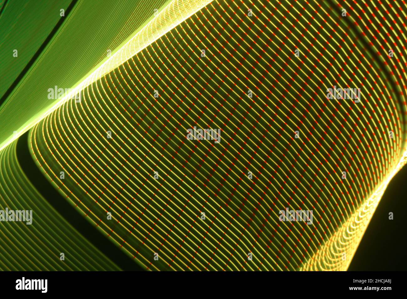 A pattern of yellowish-green light, a section of the electromagnetic ...