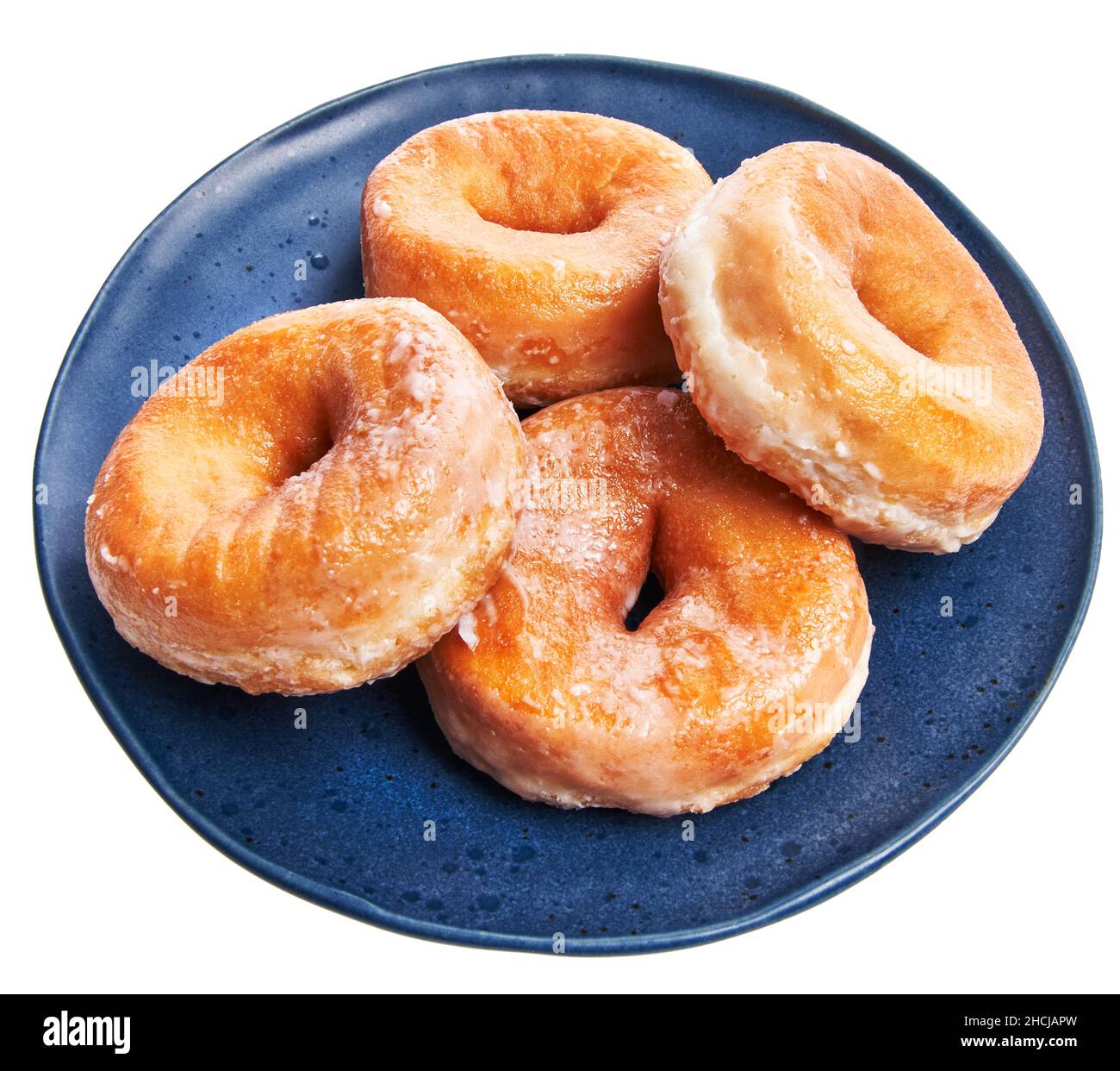 Plate of glazed doughnuts isolated over white background Stock Photo ...