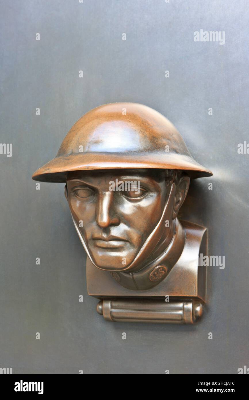 A small metal statue of a doughboy (American infantryman during World ...