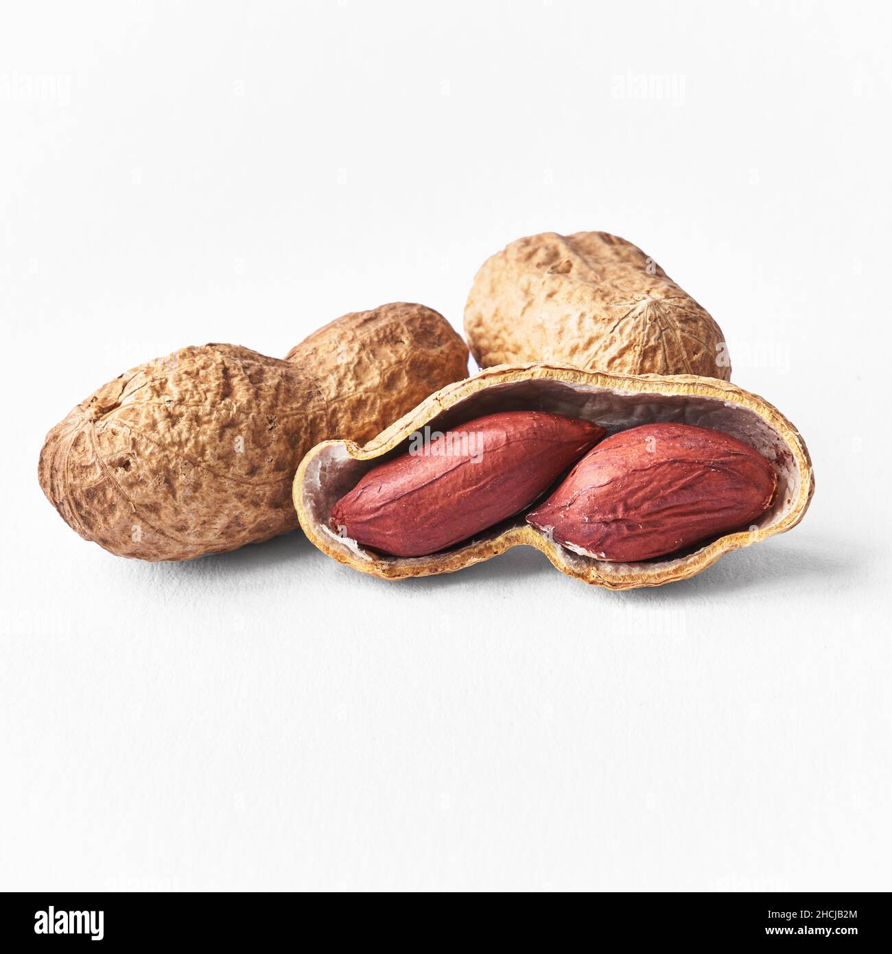 Bunch of peanuts isolated on a white background Stock Photo - Alamy