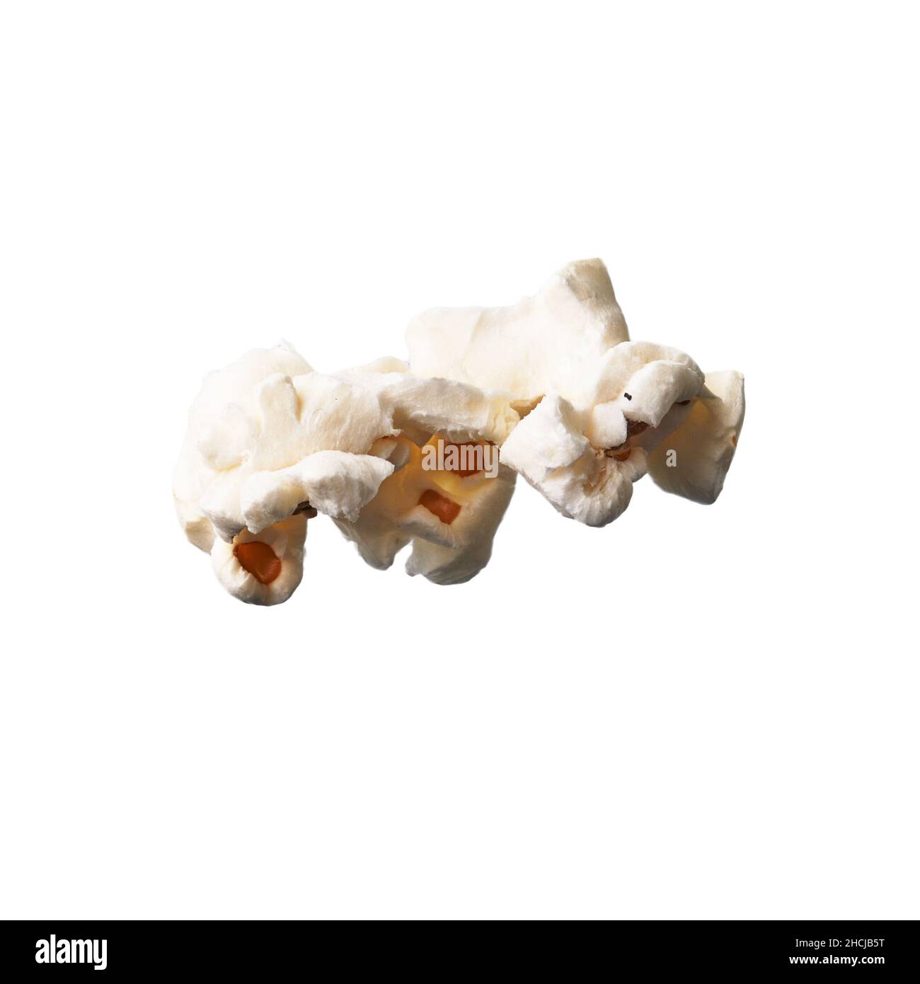 Single delicious salty popcorn isolated on a white background Stock ...
