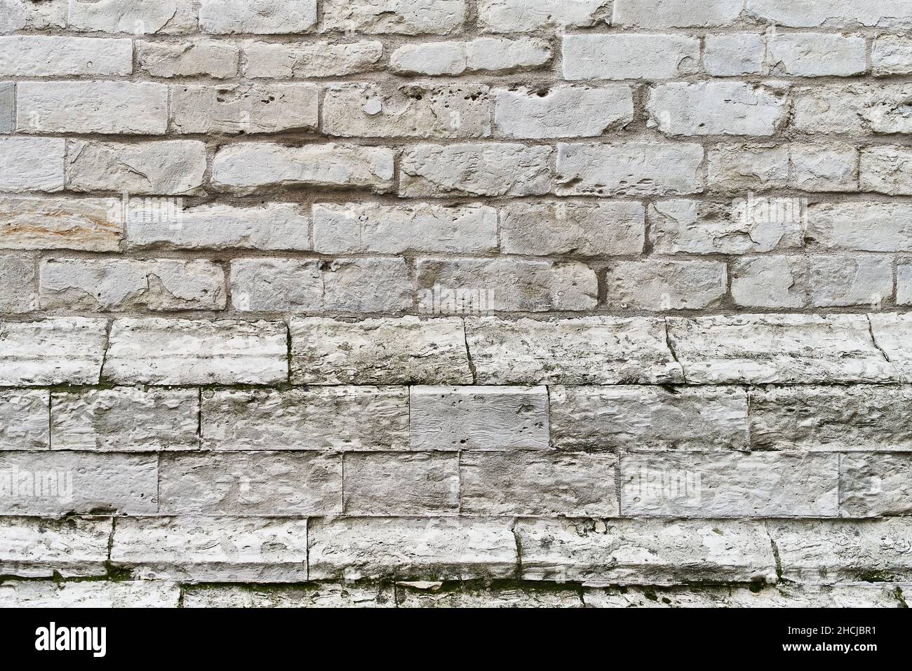 Stone brick wall surface background Stock Photo - Alamy