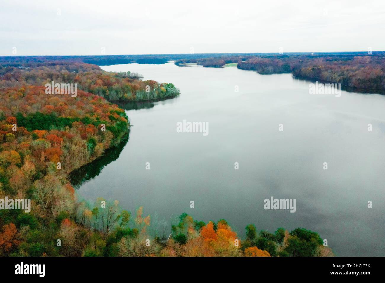 An aerial view of the beautiful Lake Townsend surrounded by autumn ...