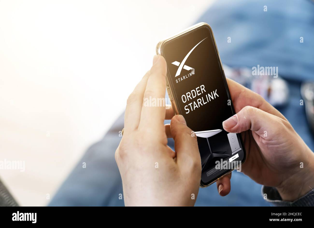 Redmond, Washington, USA, November 2021: A woman ordering a Starlink ...