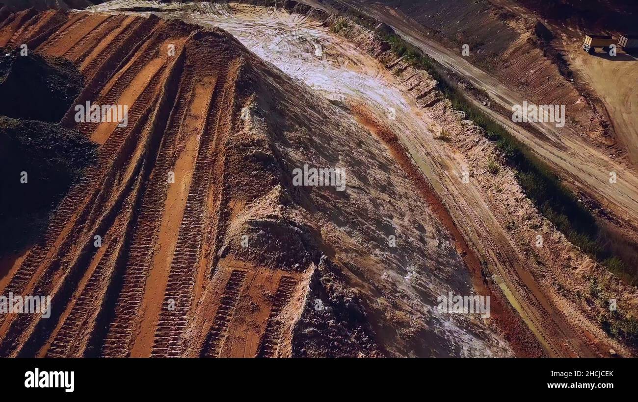 Top view of sand quarry, mining of natural resources or ore, heavy ...