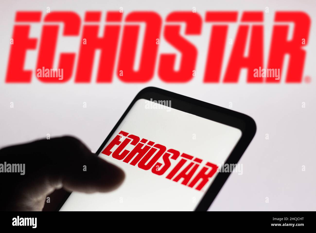 In this photo illustration, the EchoStar Corporation logo seen ...