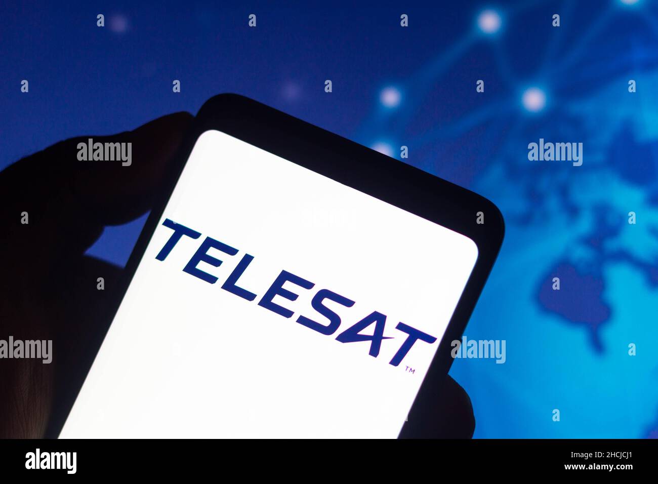 In this photo illustration, the Telesat Canada logo seen displayed on a ...