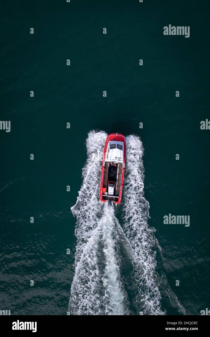 Small Red Passenger Ferry at Sea Stock Photo - Alamy