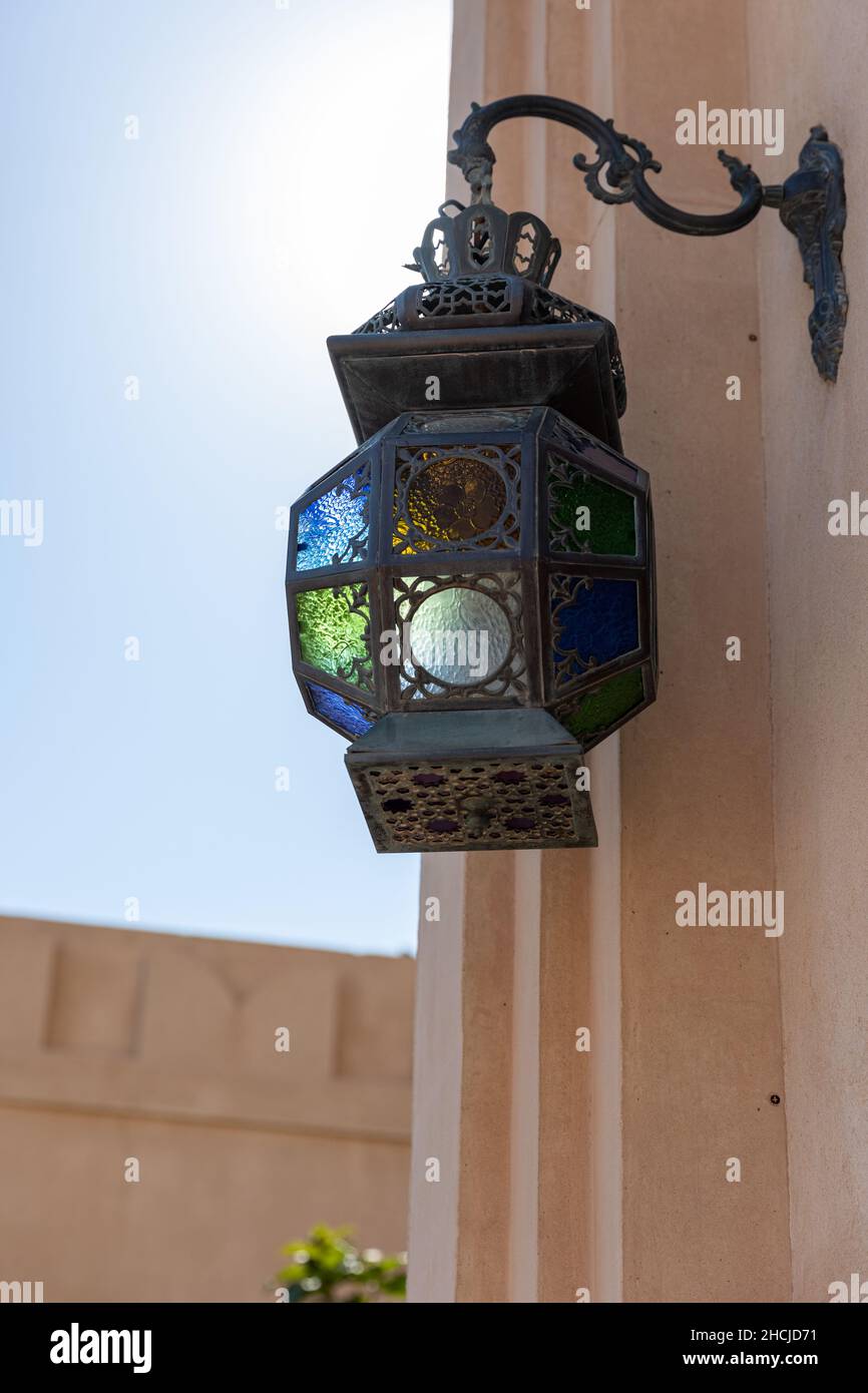 Closeup of an old Lewondr Hanging Lamp Bracket on the wall against a ...