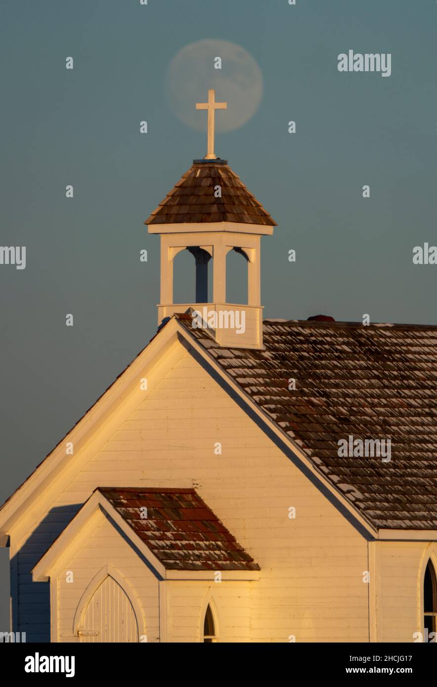 Moon rising over Prairie Country Church Canada Stock Photo - Alamy