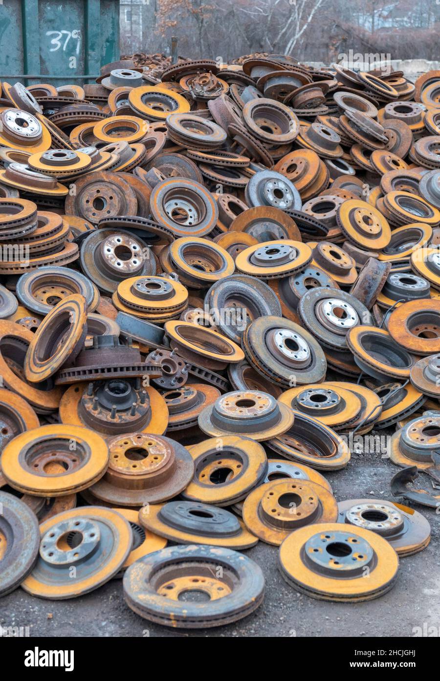 Old car wheels rusting in a scrap metal yard Stock Photo - Alamy