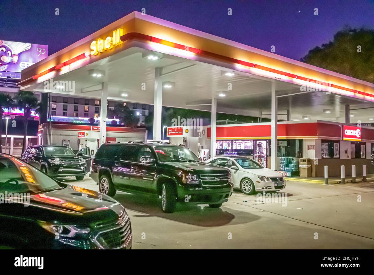 Night nighttime shell gas petrol station vehicles hi-res stock ...