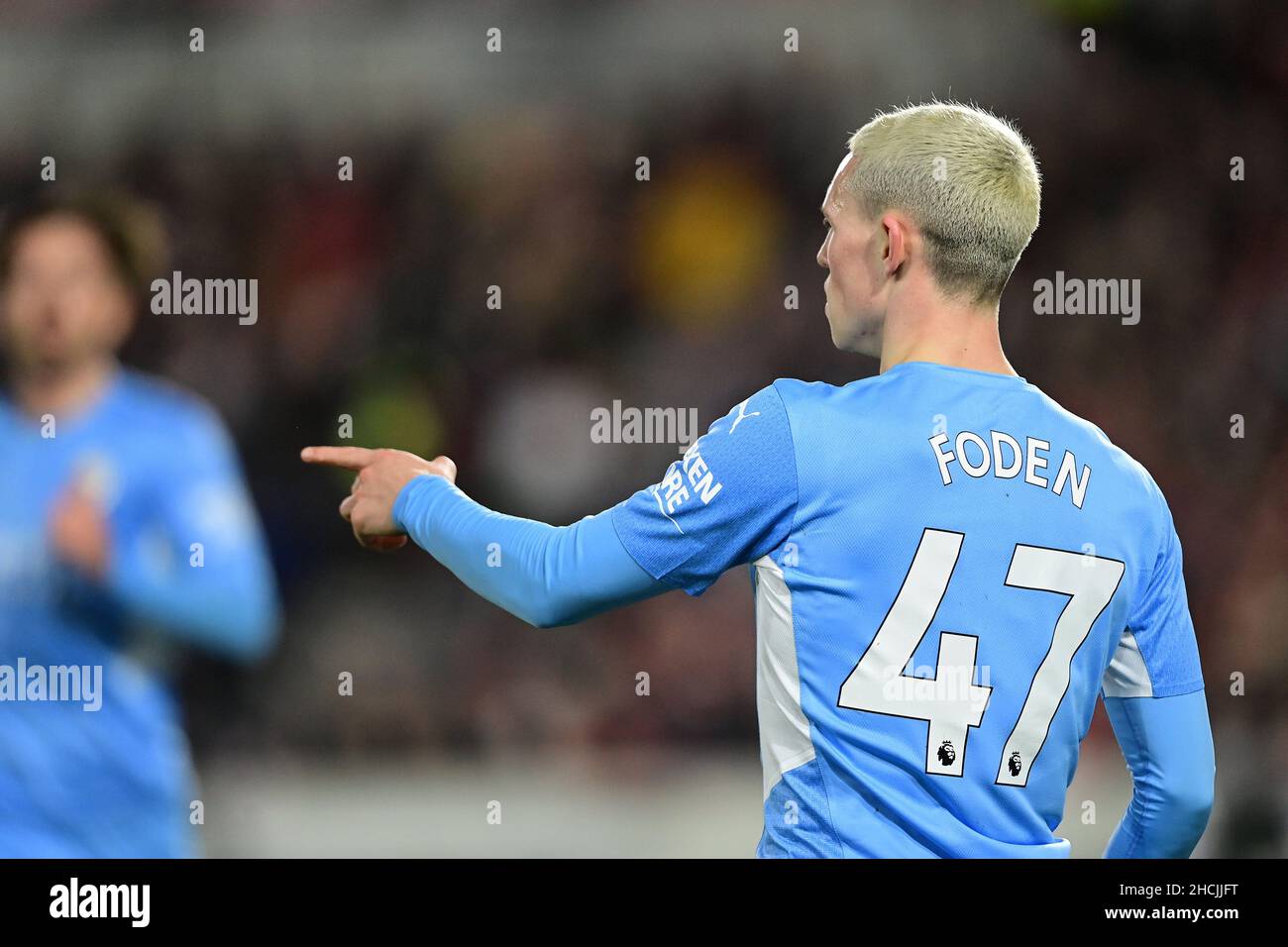 Phil Foden #47 of Manchester City celebrates scoring the opening goal ...