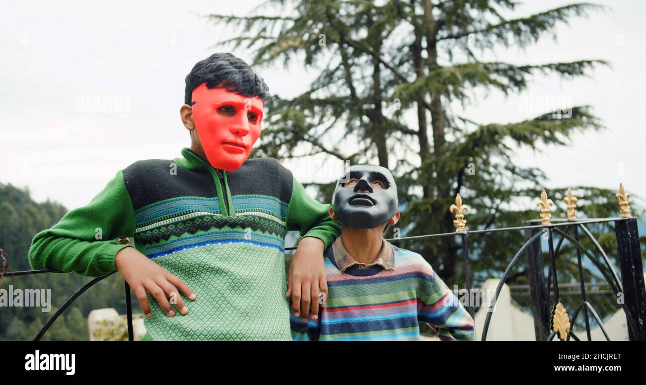 Group of young Indian kids with funny face masks posing outside Stock ...