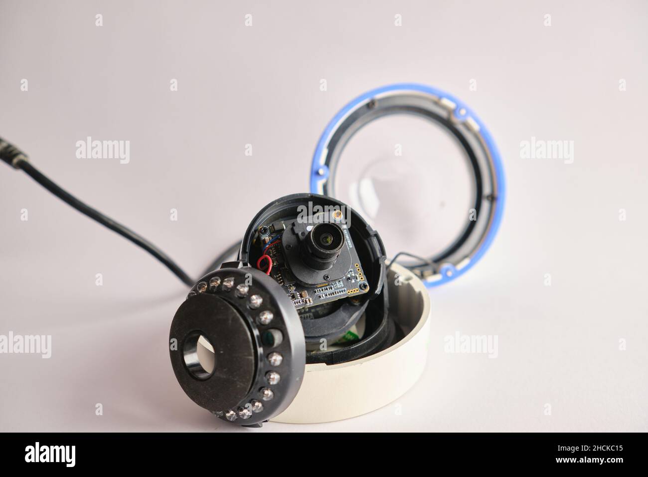 disassembled IP video surveillance camera on white background, isolated ...