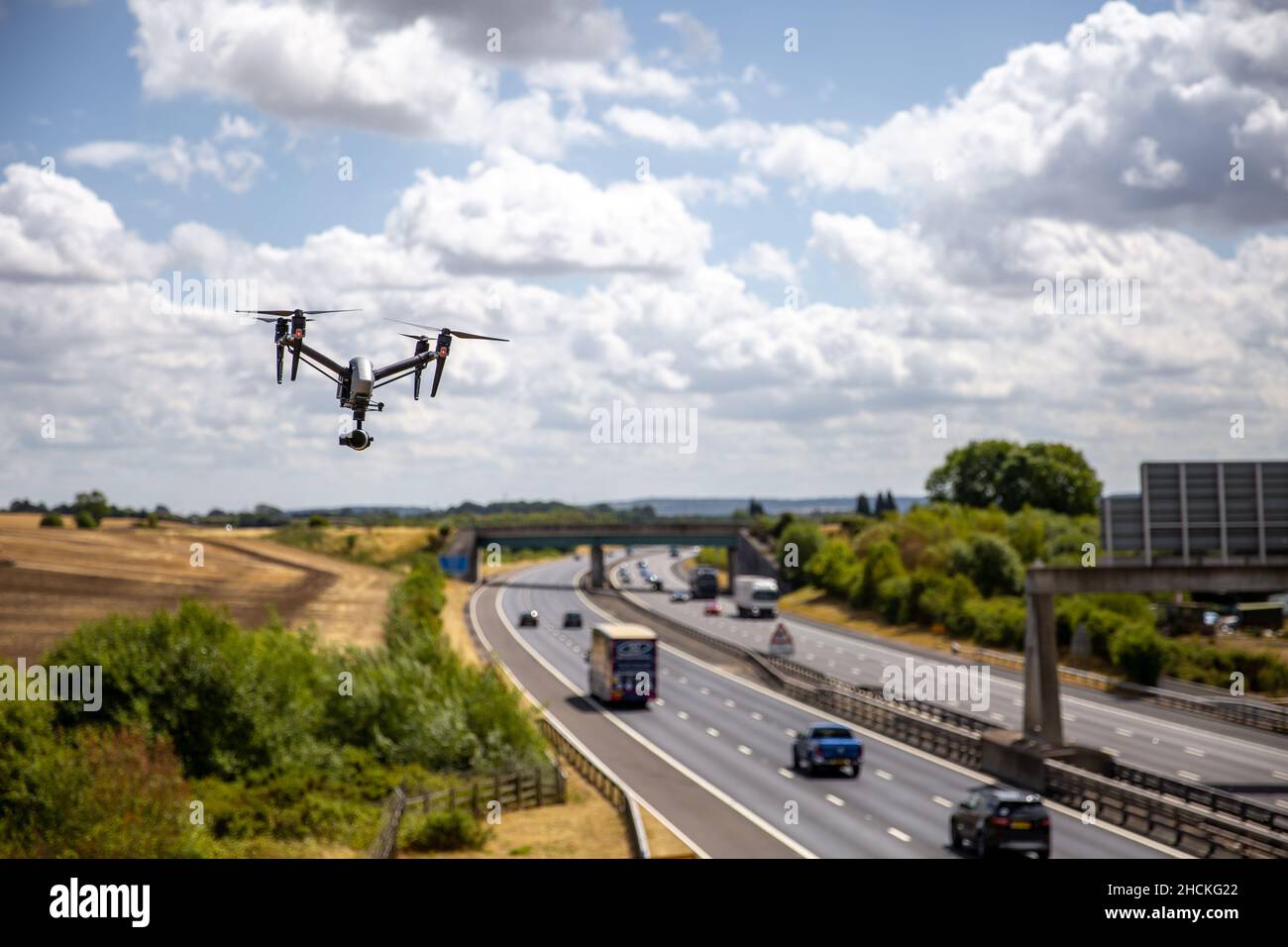 Drone Flying Alongside a Highway Stock Photo - Alamy