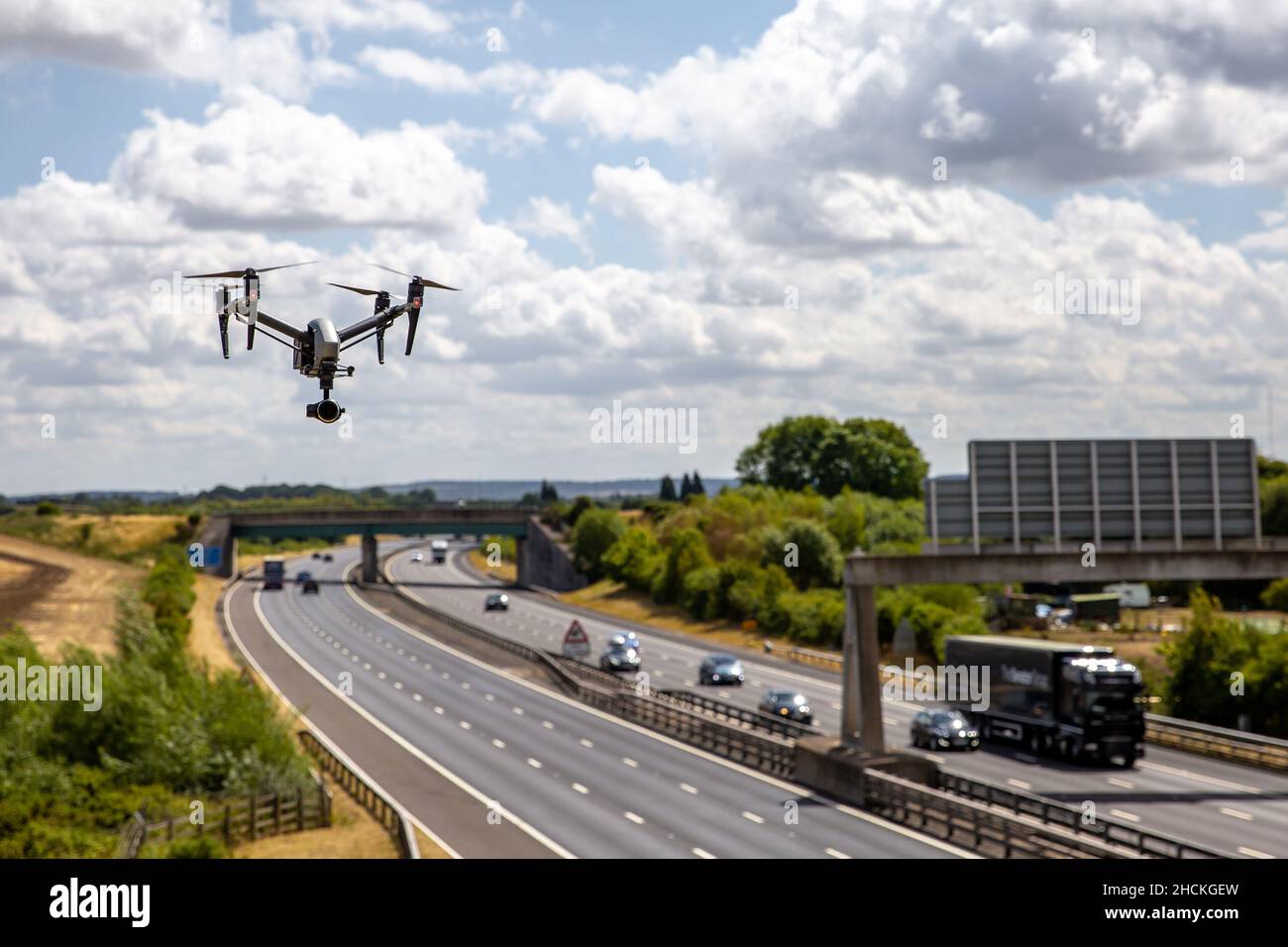 Drone Flying Alongside a Highway Stock Photo - Alamy