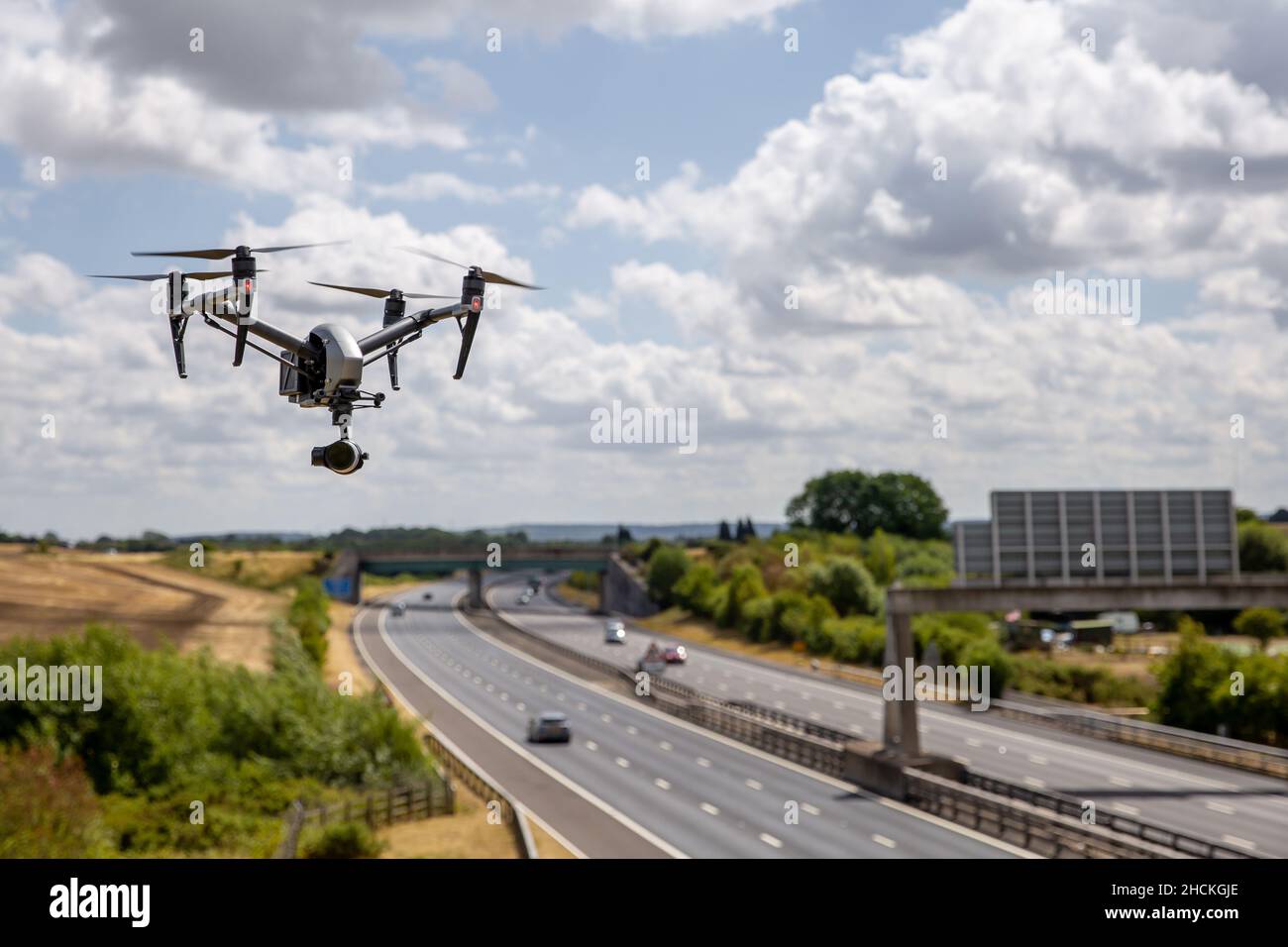 Drone Flying Alongside a Highway Stock Photo - Alamy