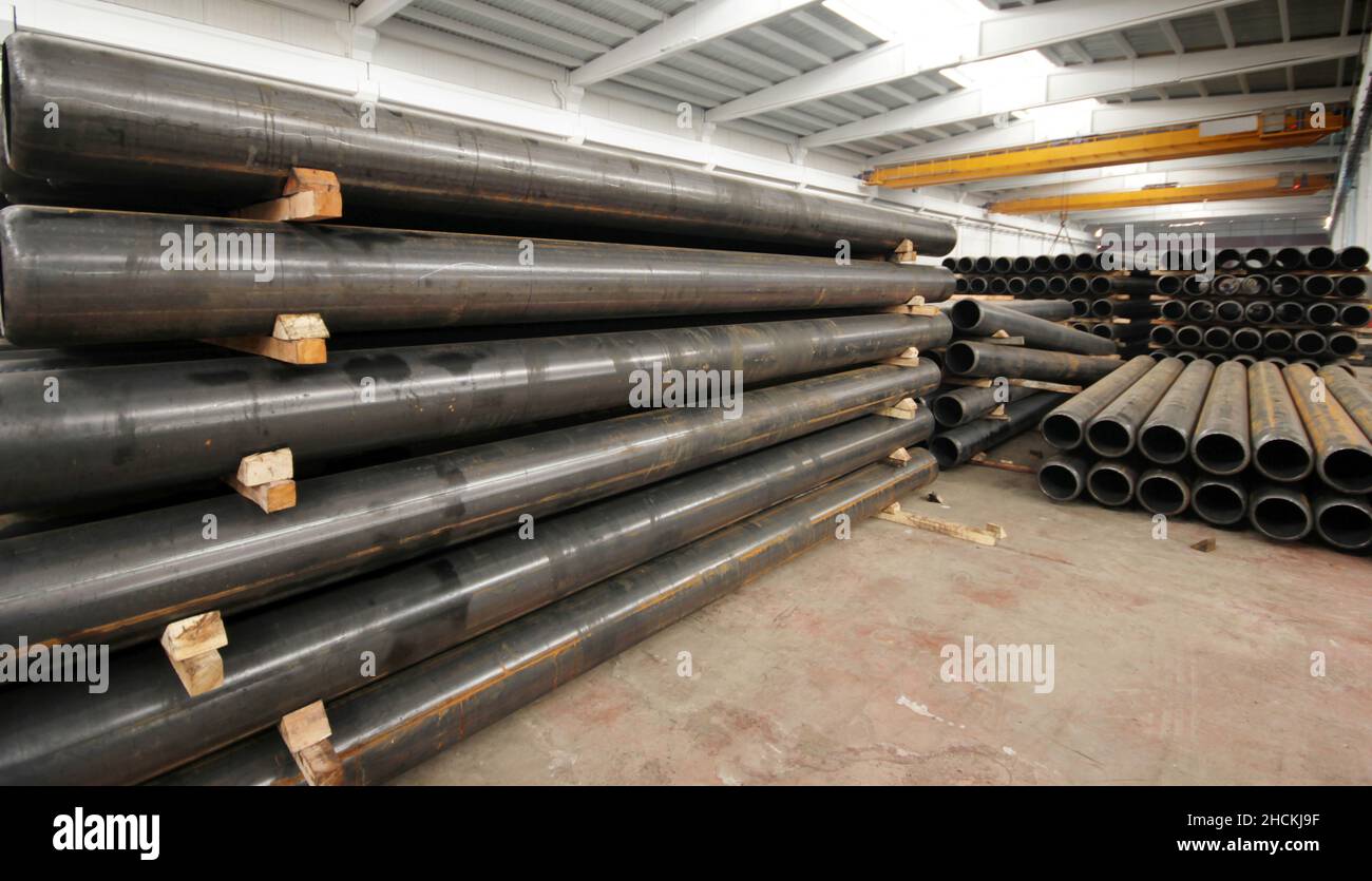 steel pipes inside the factory Stock Photo - Alamy