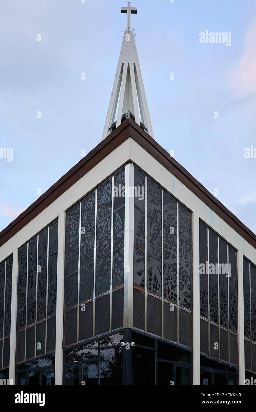 A facade view of St. Mary Immaculate Catholic Church with a cross on a ...