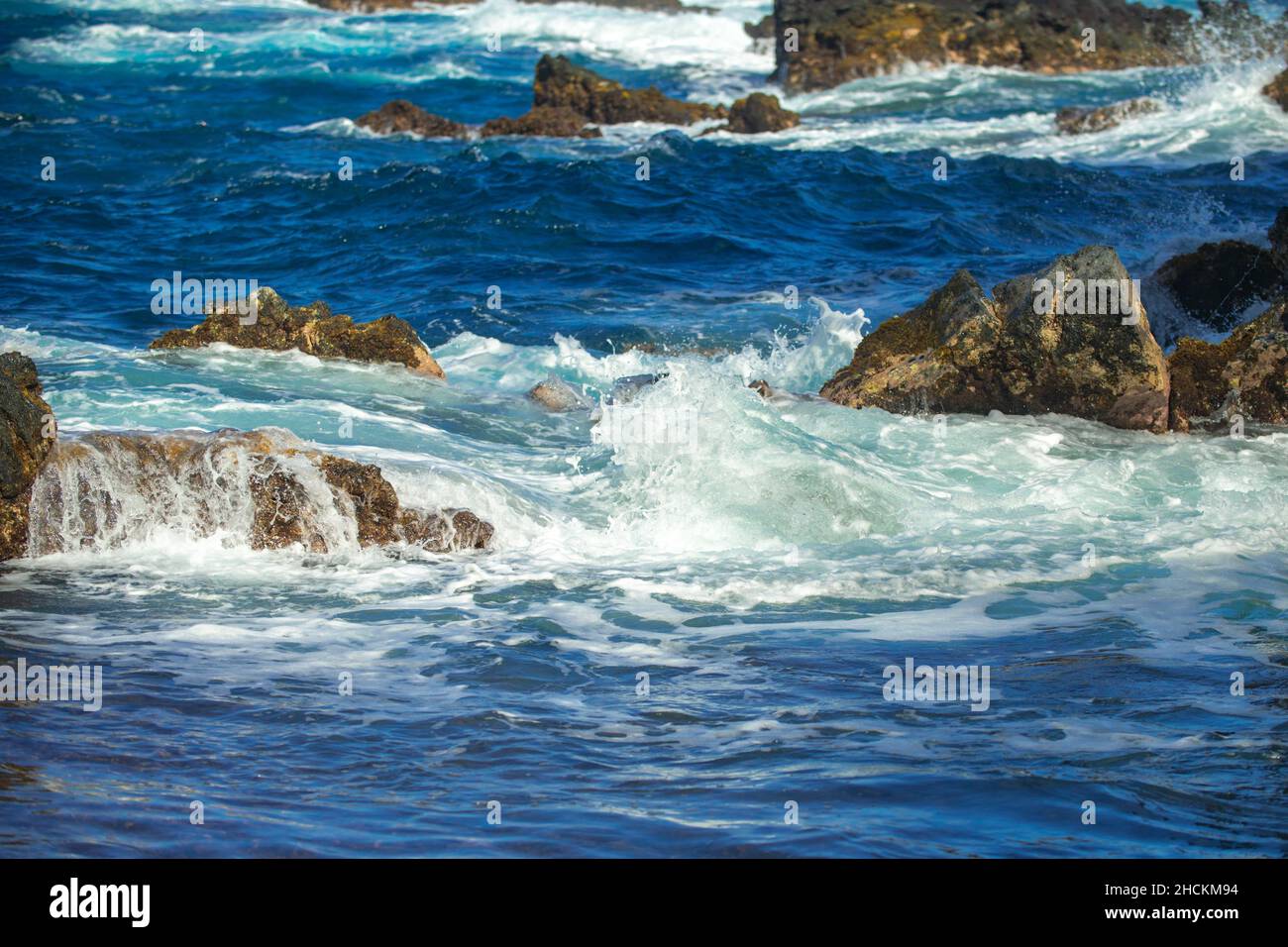 Sea stone beach, sea waves. Colorful blue sea background. The concept ...