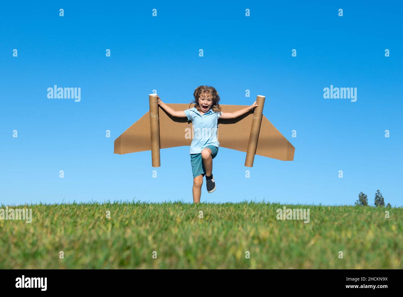 Boy child with wings at sky imagines a pilot and dreams of flying Stock ...