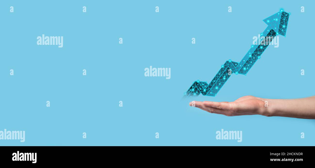 Businessman hold graph, arrow of positive growth icon.pointing at ...