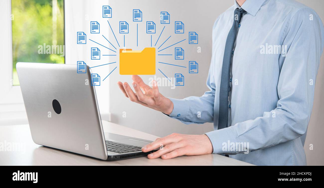 Document Management System DMS .Businessman hold folder and document ...