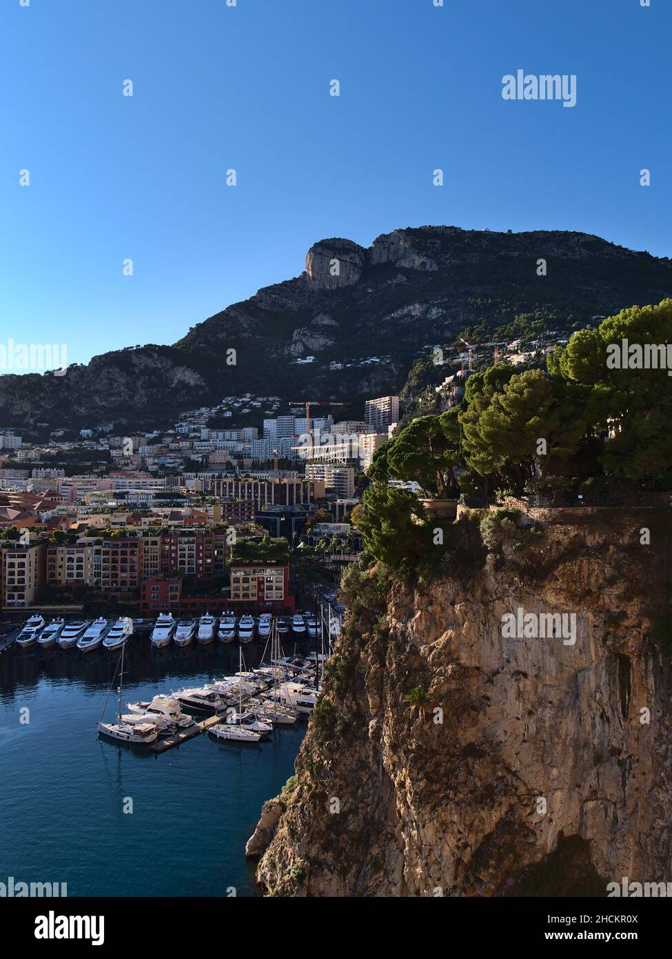 Cityscape of Monaco at the mediterranean coast with steep rocks and ...